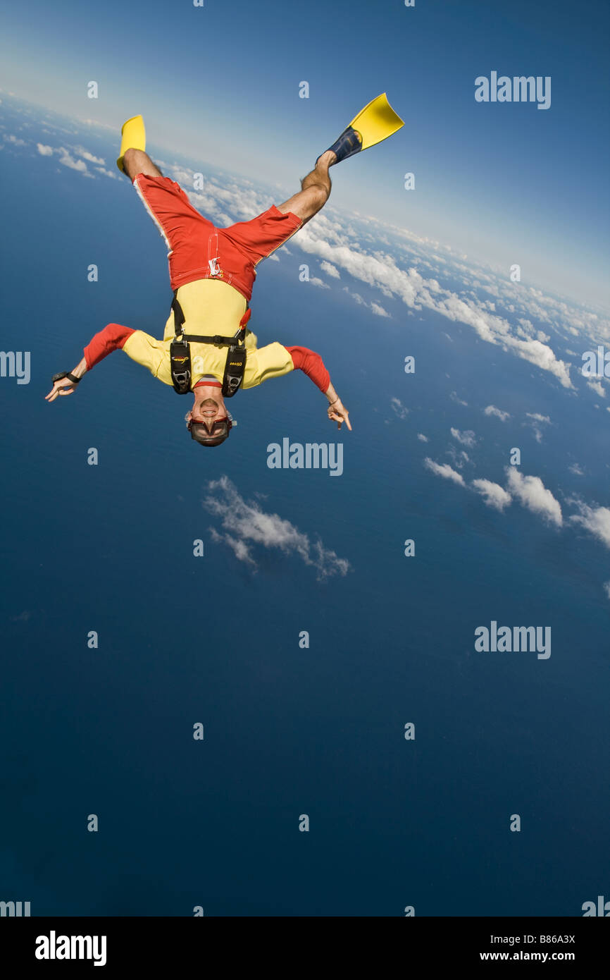 Scuba diver is flying in the sky with mask hi-res stock photography and ...