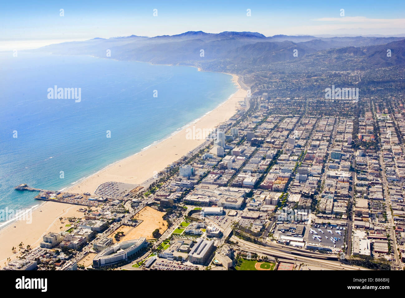 downtown Santa Monica Pier and beach with Santa Monica Mountains Stock ...