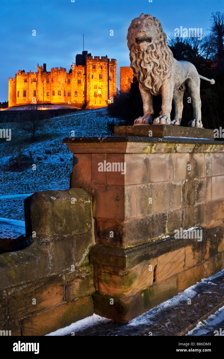 Carved lion on a bridge over the river Aln leading to the town of ...