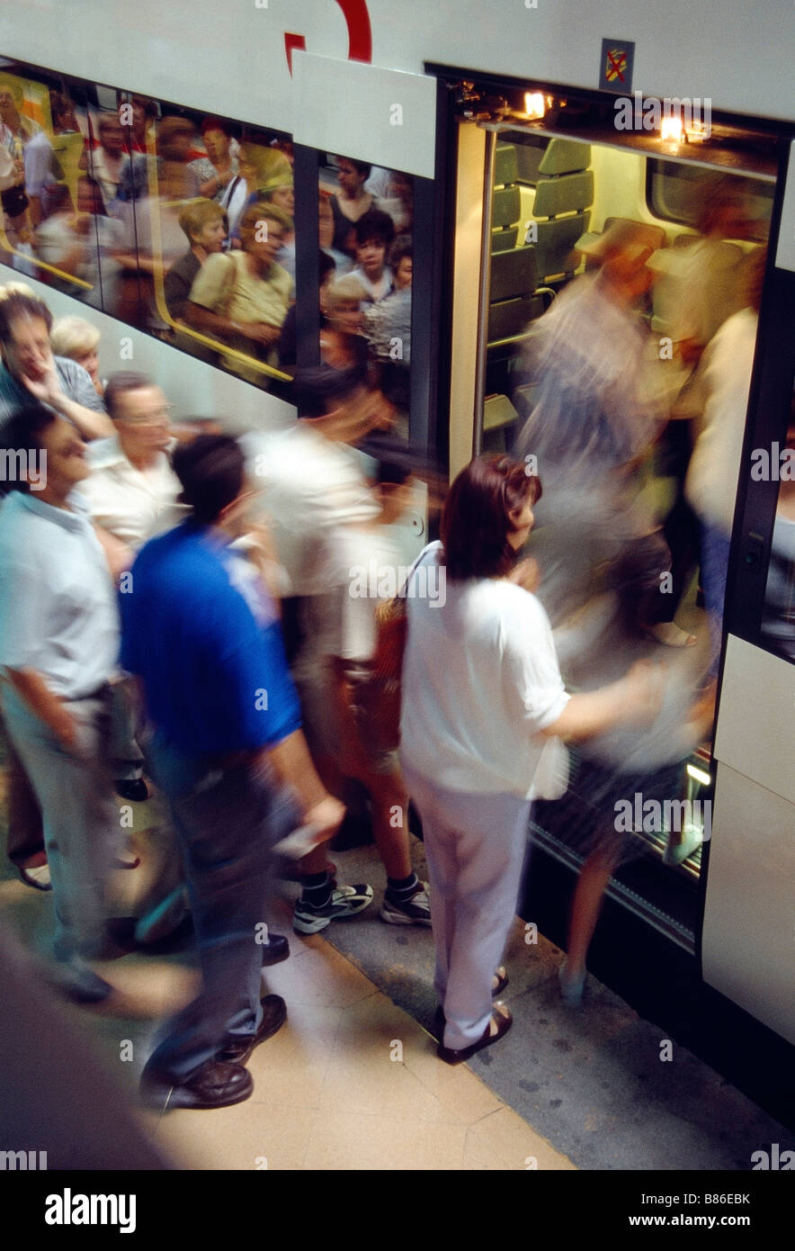 People getting on the train. Atocha Railway Station. Madrid. Spain ...