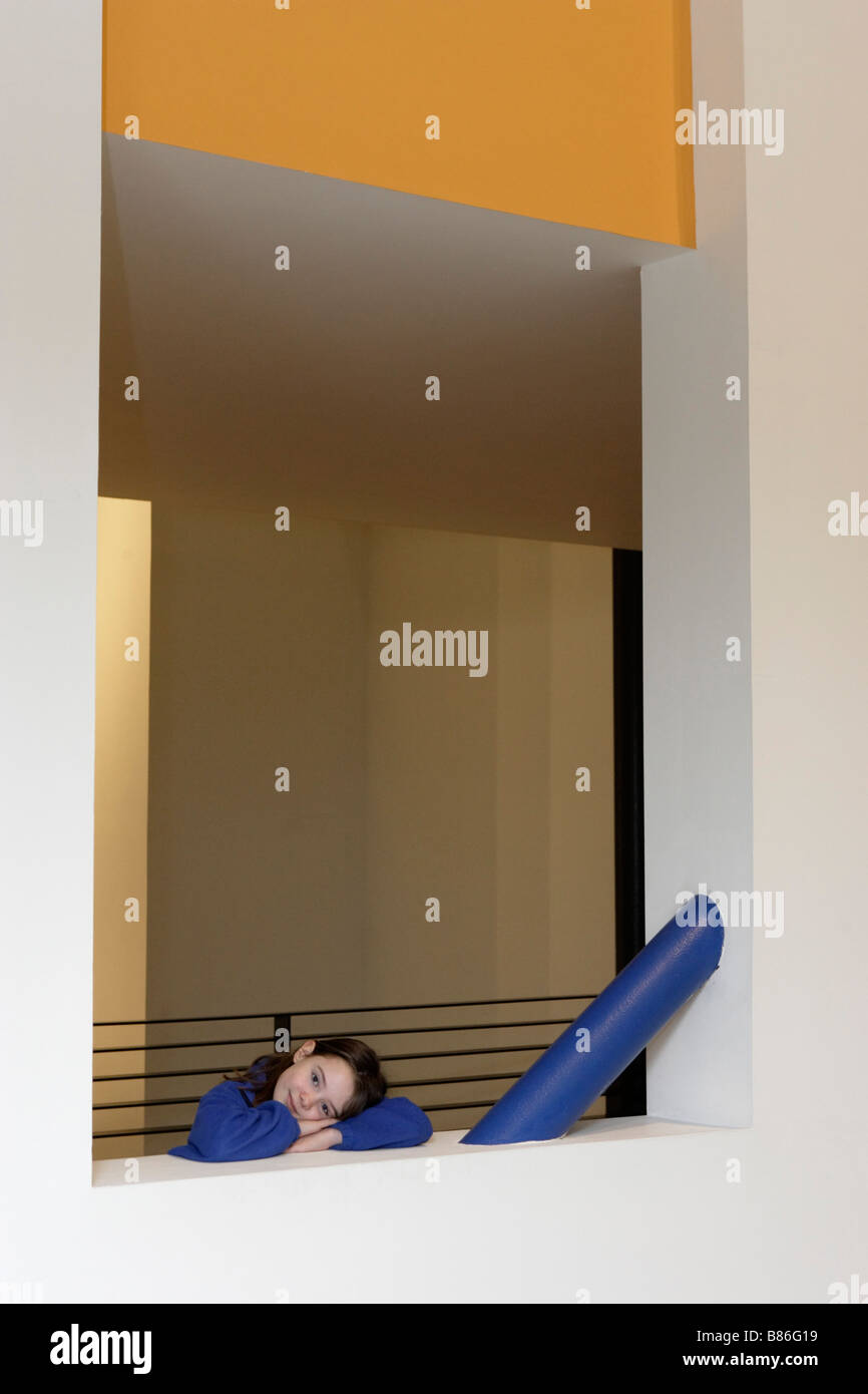 Girl in window Stock Photo - Alamy