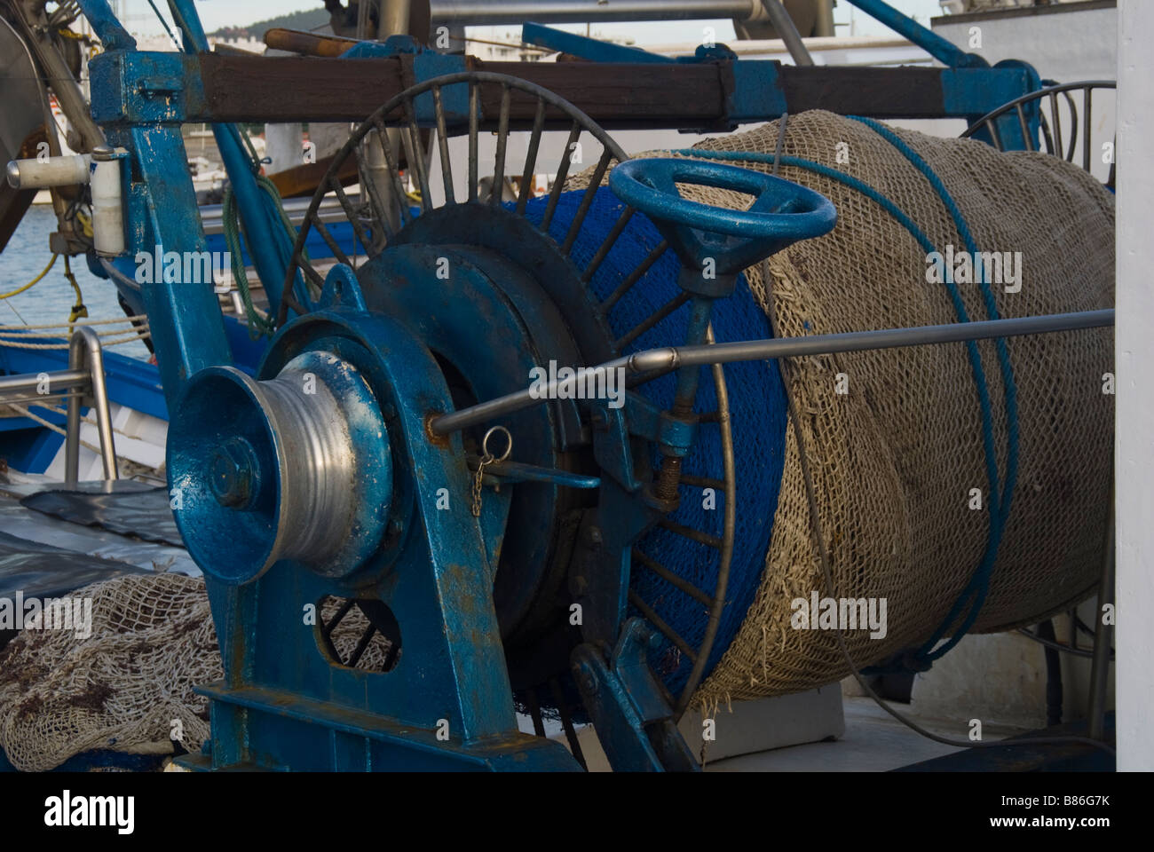 Detail view of a trawler net and net drum Stock Photo - Alamy
