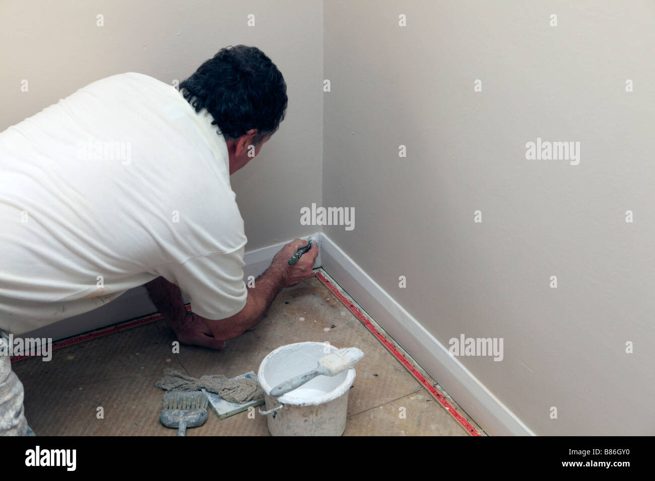 united kingdom a decorator at work in a private house Stock Photo - Alamy
