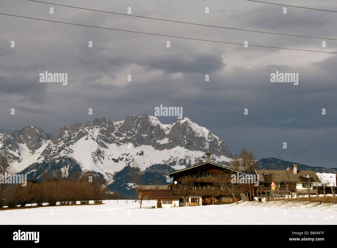 The spectacular view on the Wilder Kaiser with farmer's land in the ...
