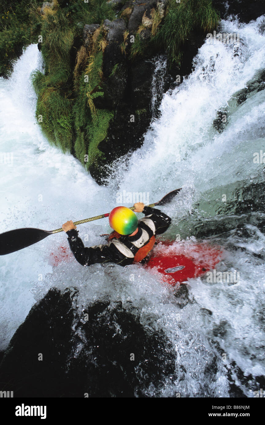 A kayaker drops Steelhead Falls on the Deschutes River Stock Photo - Alamy