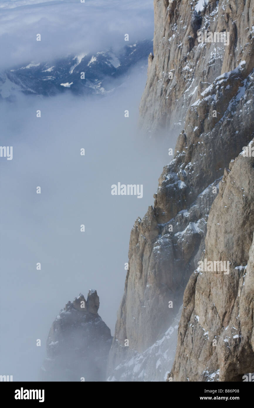 A steep mountain among clouds Stock Photo - Alamy