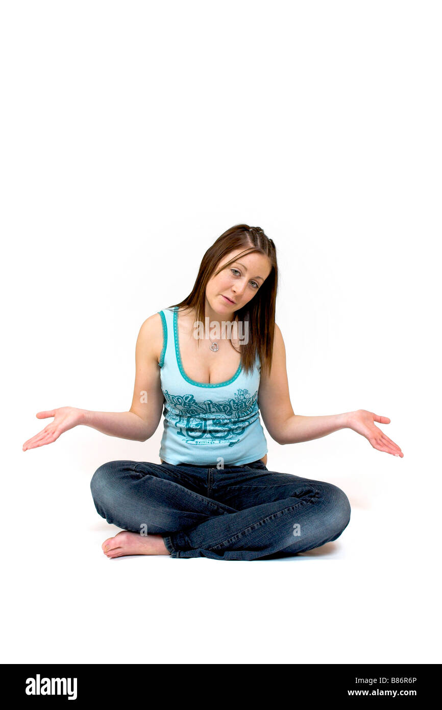 Teenage girl sitting crossed legged hi-res stock photography and images ...