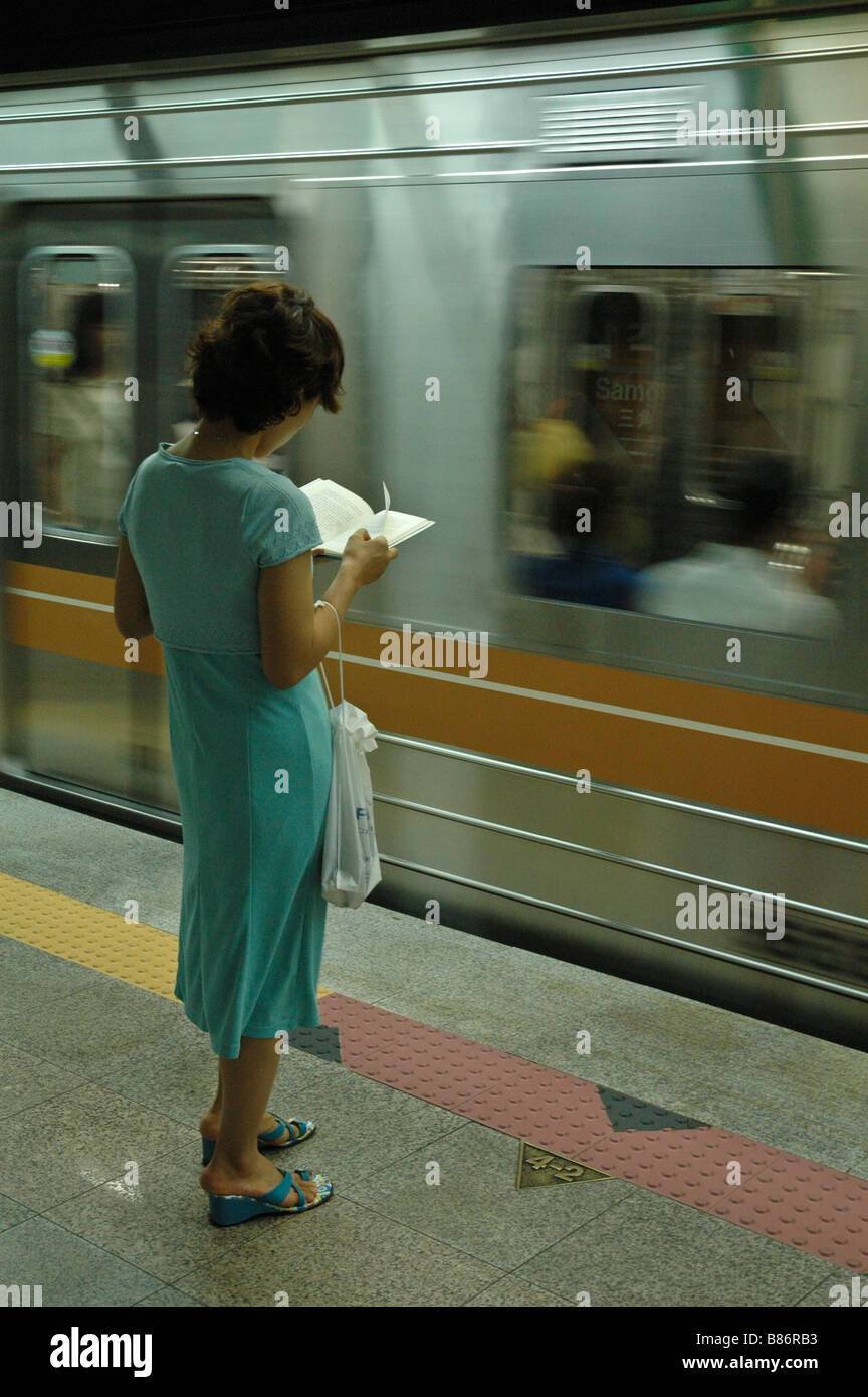 Waiting for train Stock Photo - Alamy