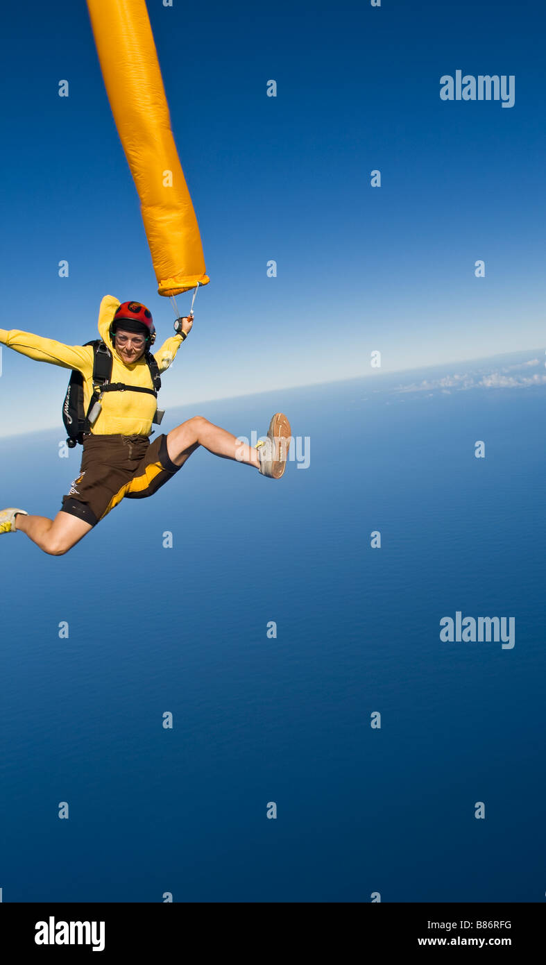 Skydive tube jumper over Oahu, Hawaii, USA. Man is flying in freefly ...