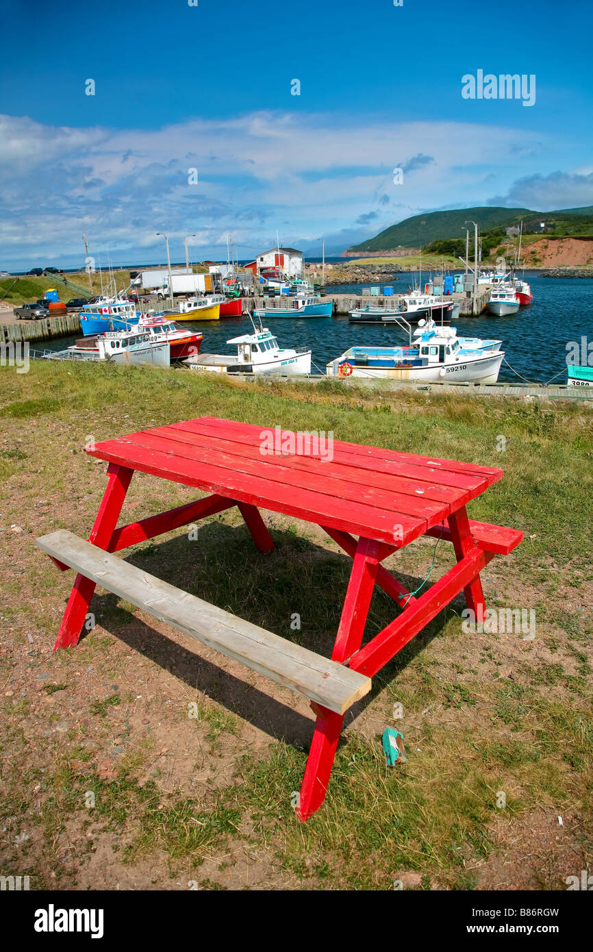 picnic table beside harbour Stock Photo - Alamy