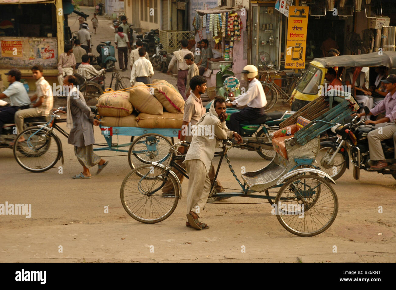 Busy street scene varanasi hi-res stock photography and images - Alamy