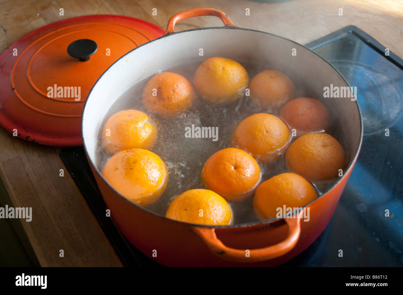 Seville Oranges boiling for marmalade Stock Photo - Alamy