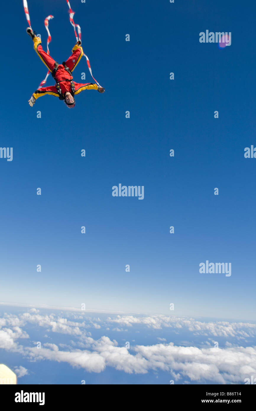 Skydive jump over Oahu, Hawaii, USA. Man is tracking in freefly ...