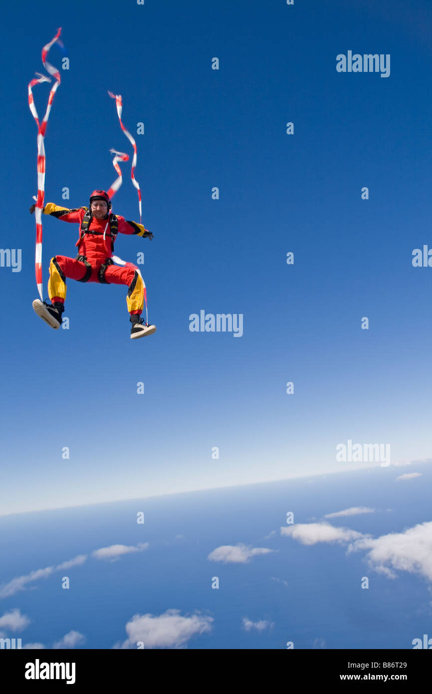 Skydive jump over Oahu, Hawaii, USA. Man is tracking in freefly ...