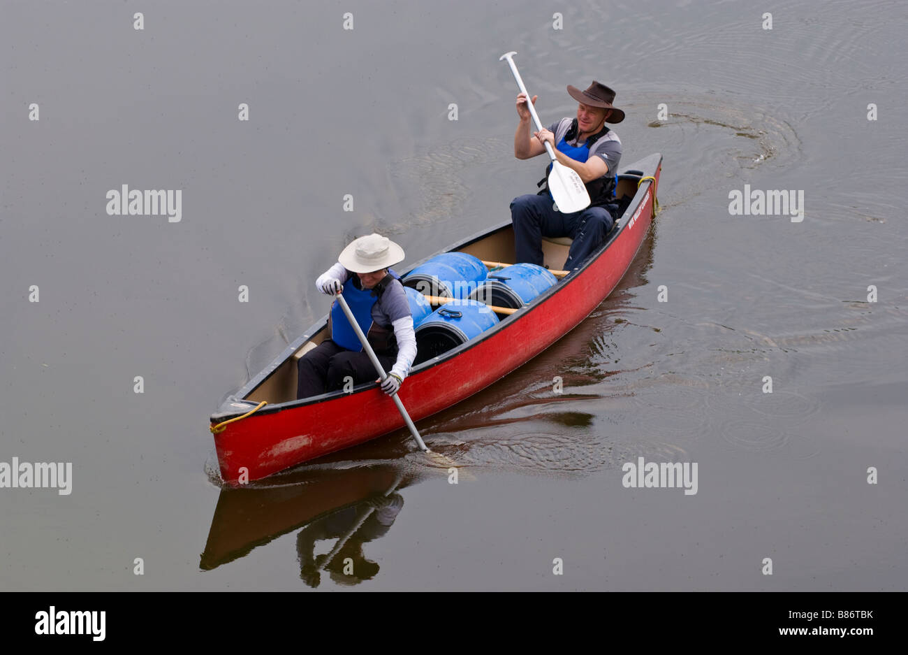 Canoeists on River Wye paddeling in open canoe UK Stock Photo - Alamy