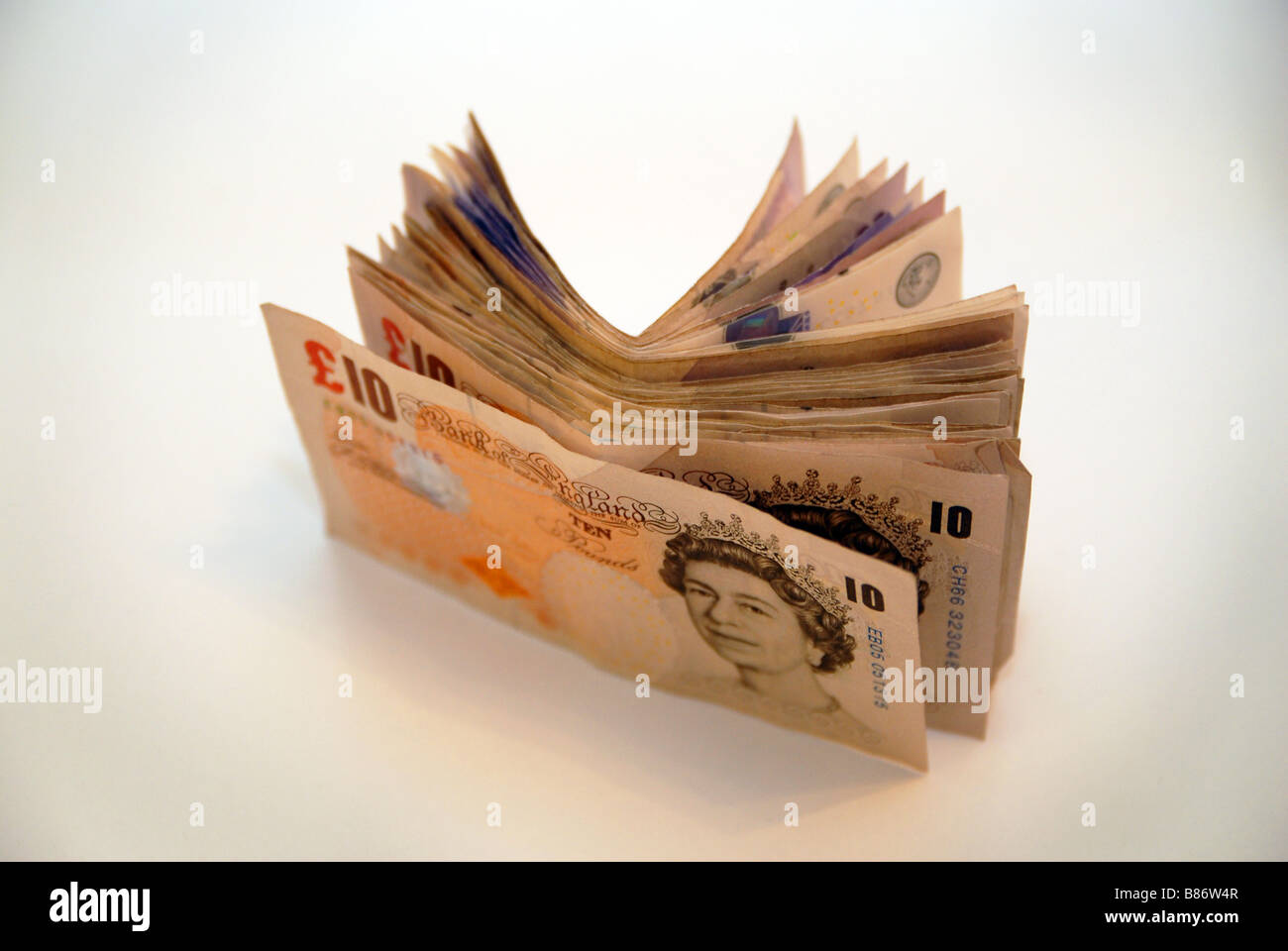 A stack / pile of used £10 Stirling bank notes, used notes ( currency ...