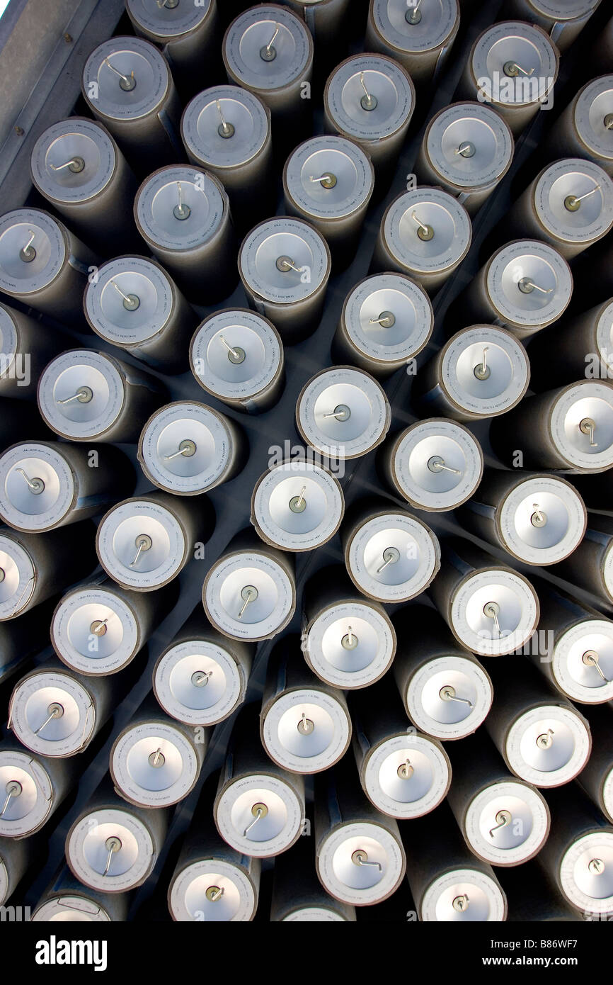 Round air filters form a pattern underneath and air intake system in an ...