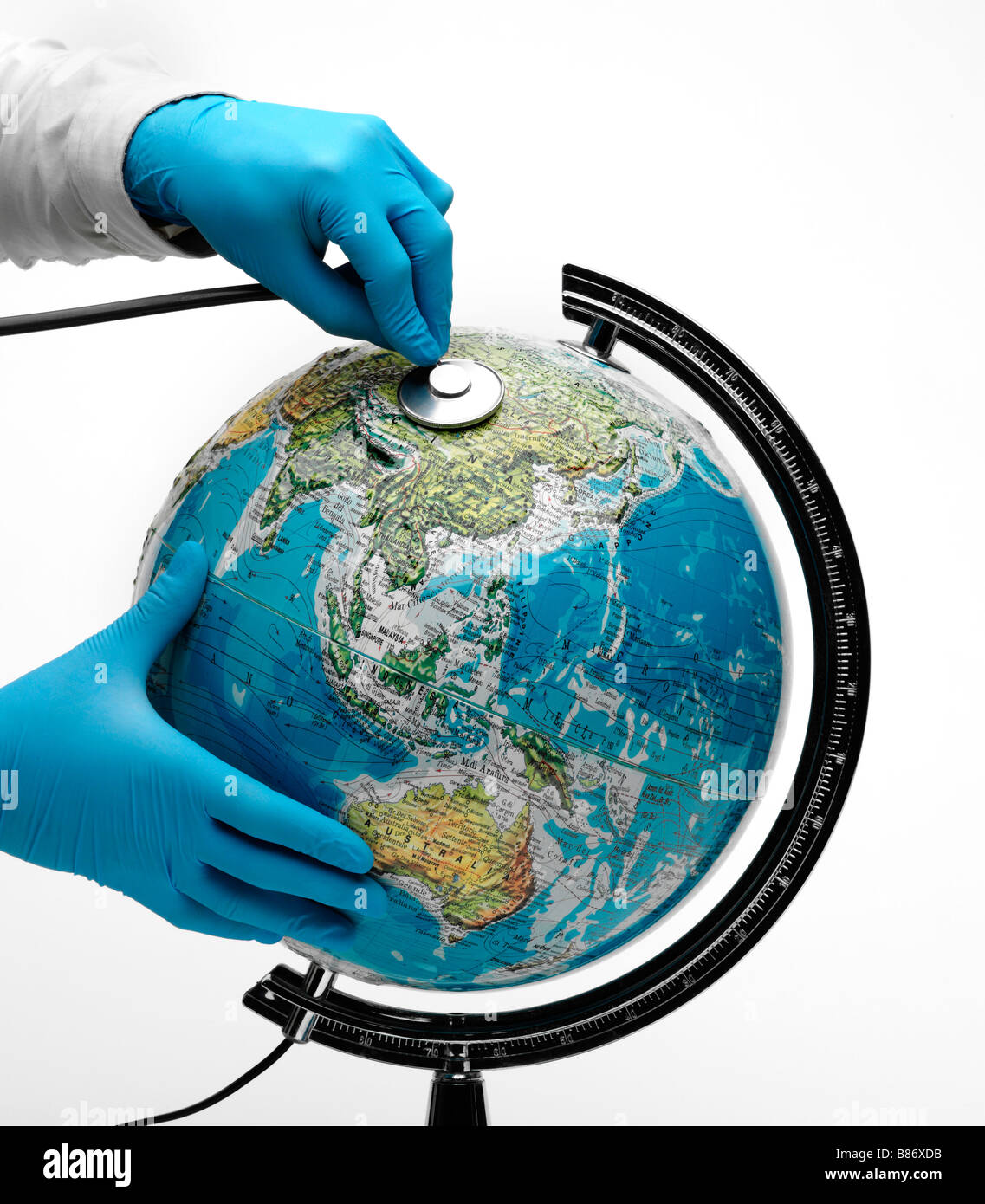Doctor examine with stetoscope the ill Earth Stock Photo - Alamy