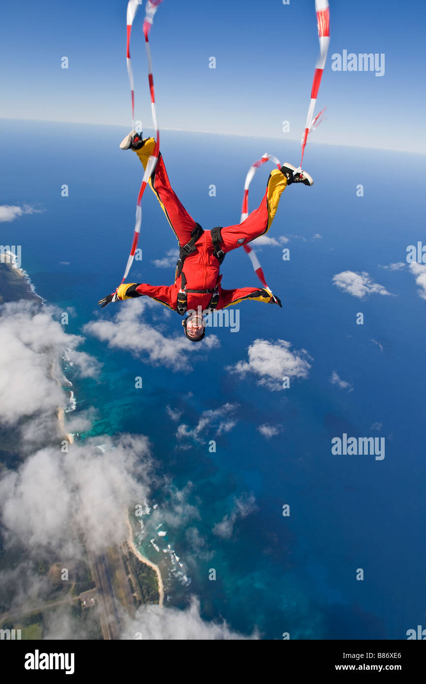 Skydive jump over Oahu, Hawaii, USA. Man is tracking in freefly ...