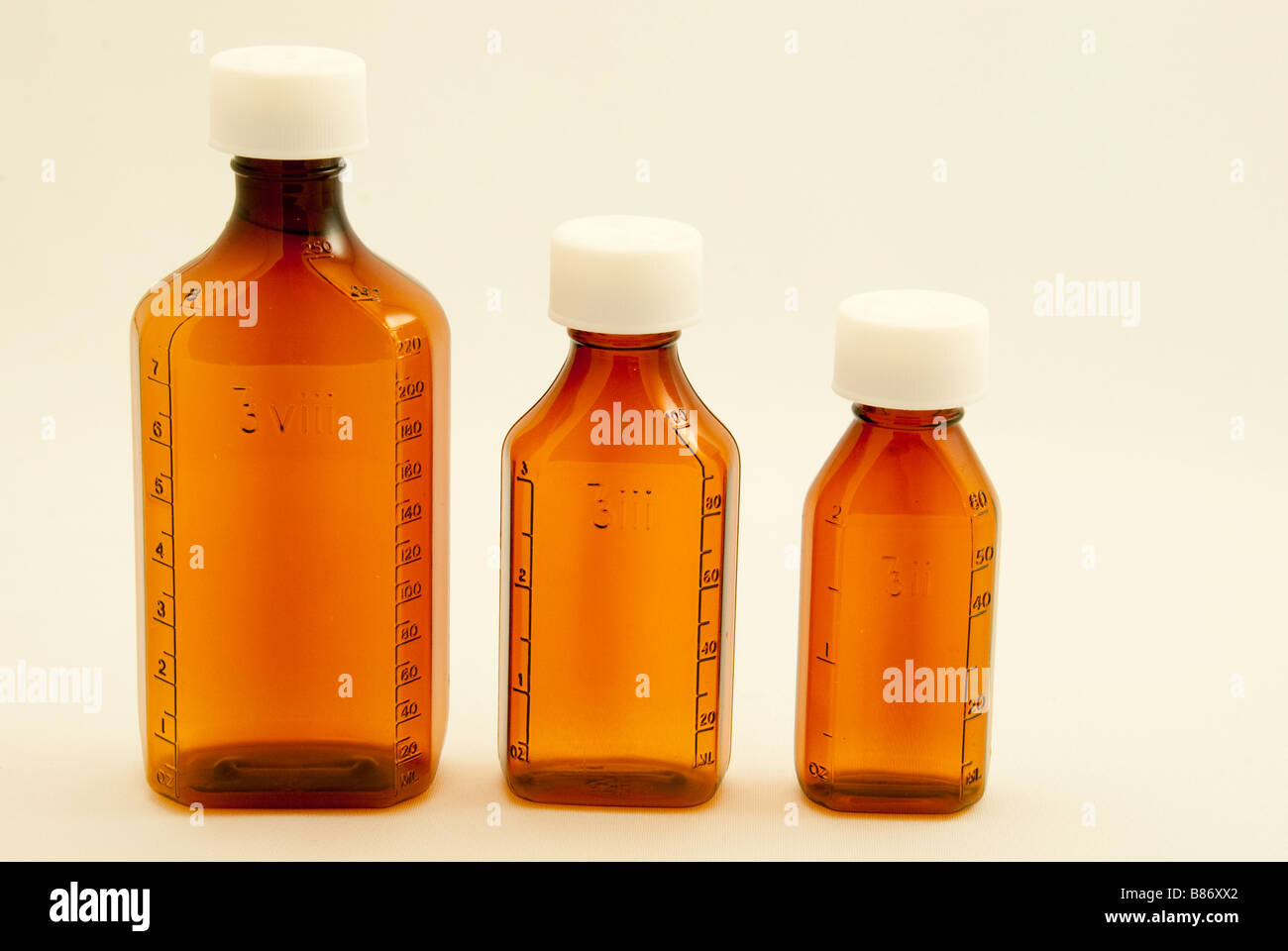 Three mixed size of Bottles Stock Photo - Alamy