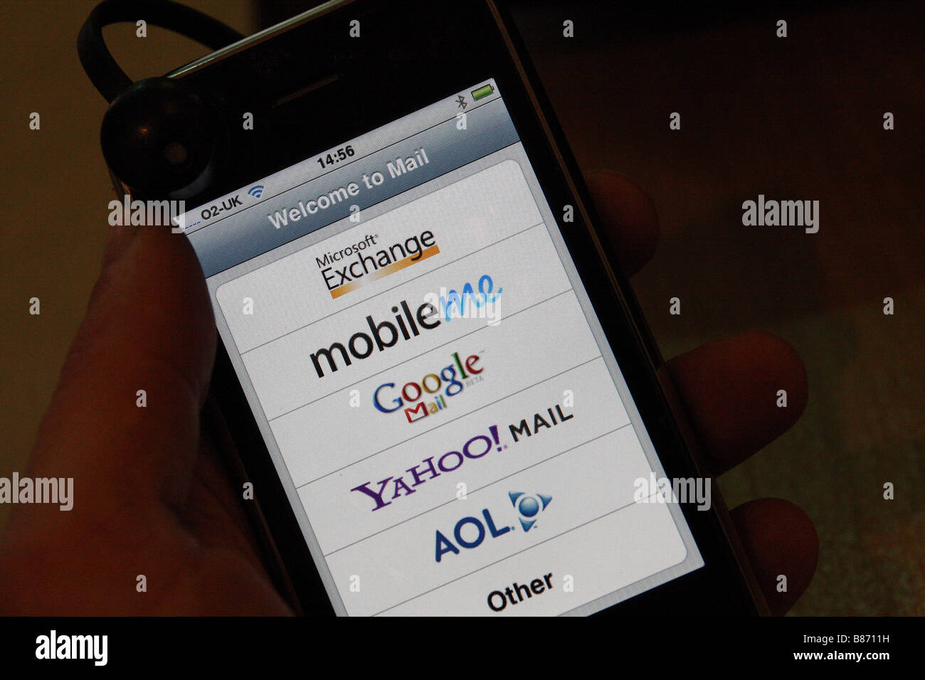 apple iphone being used in a shop to show internet connectivity on the ...