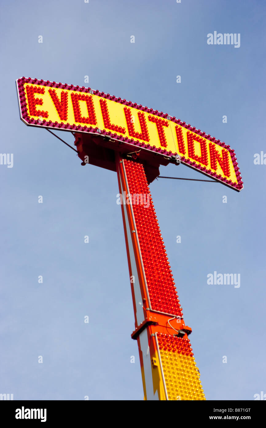 Evolution carnival ride Stock Photo - Alamy