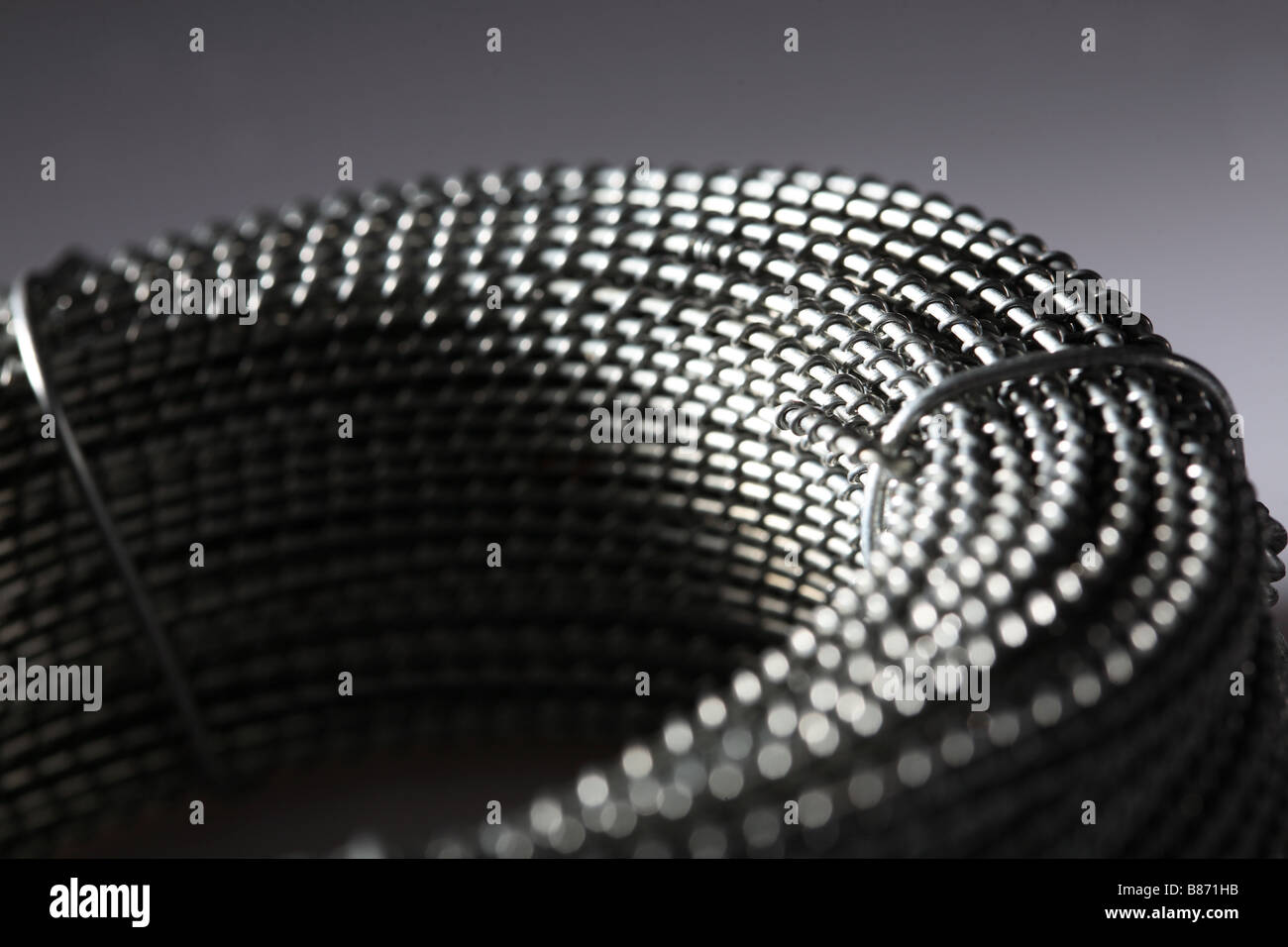 Close up of rolled fencing wires Stock Photo - Alamy