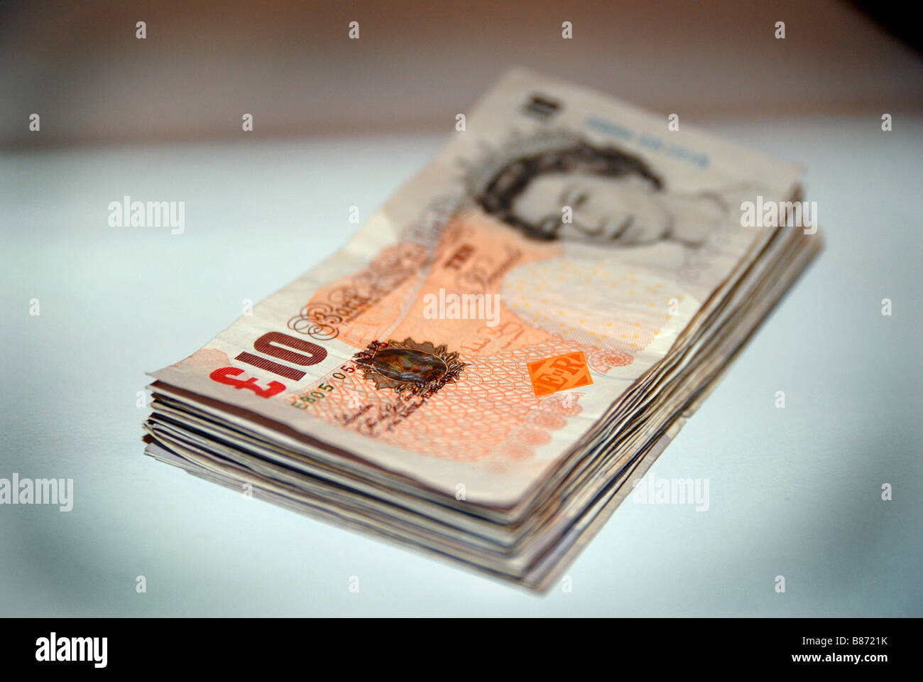 A stack / pile of used £10 Stirling bank notes, used notes ( currency ...