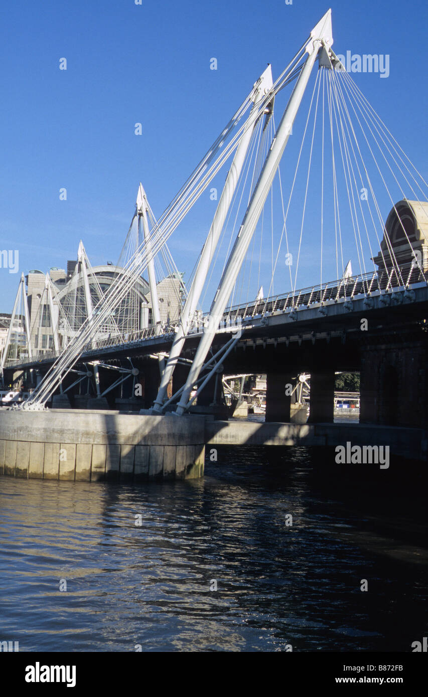 London, Hungerford Bridge, with and southern Golden Jubilee Bridge ...