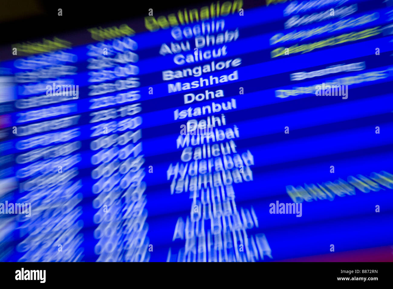 Flight departure information display screen in the departure lounge of ...