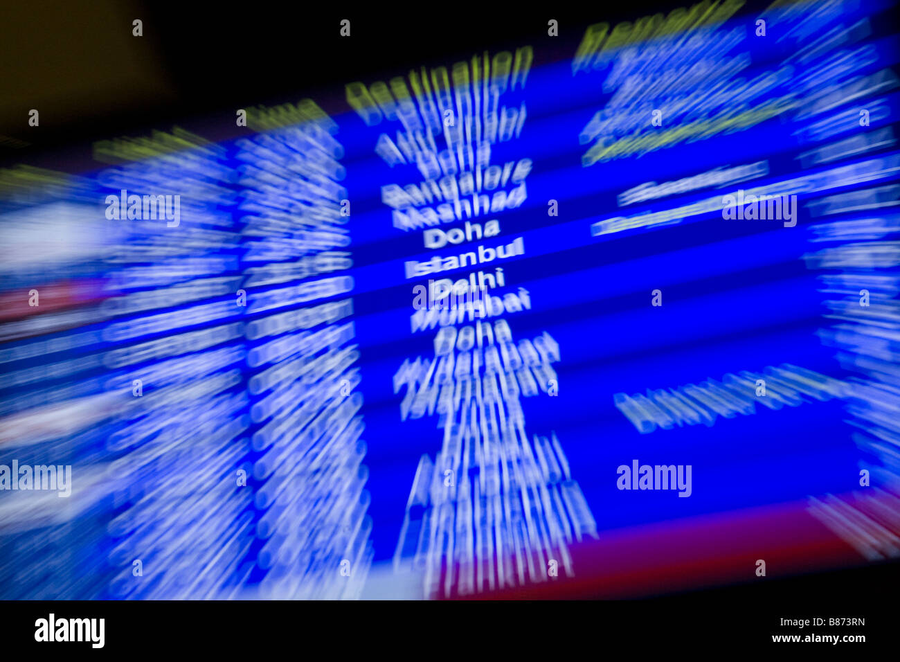 Flight departure information display screen in the departure lounge of ...