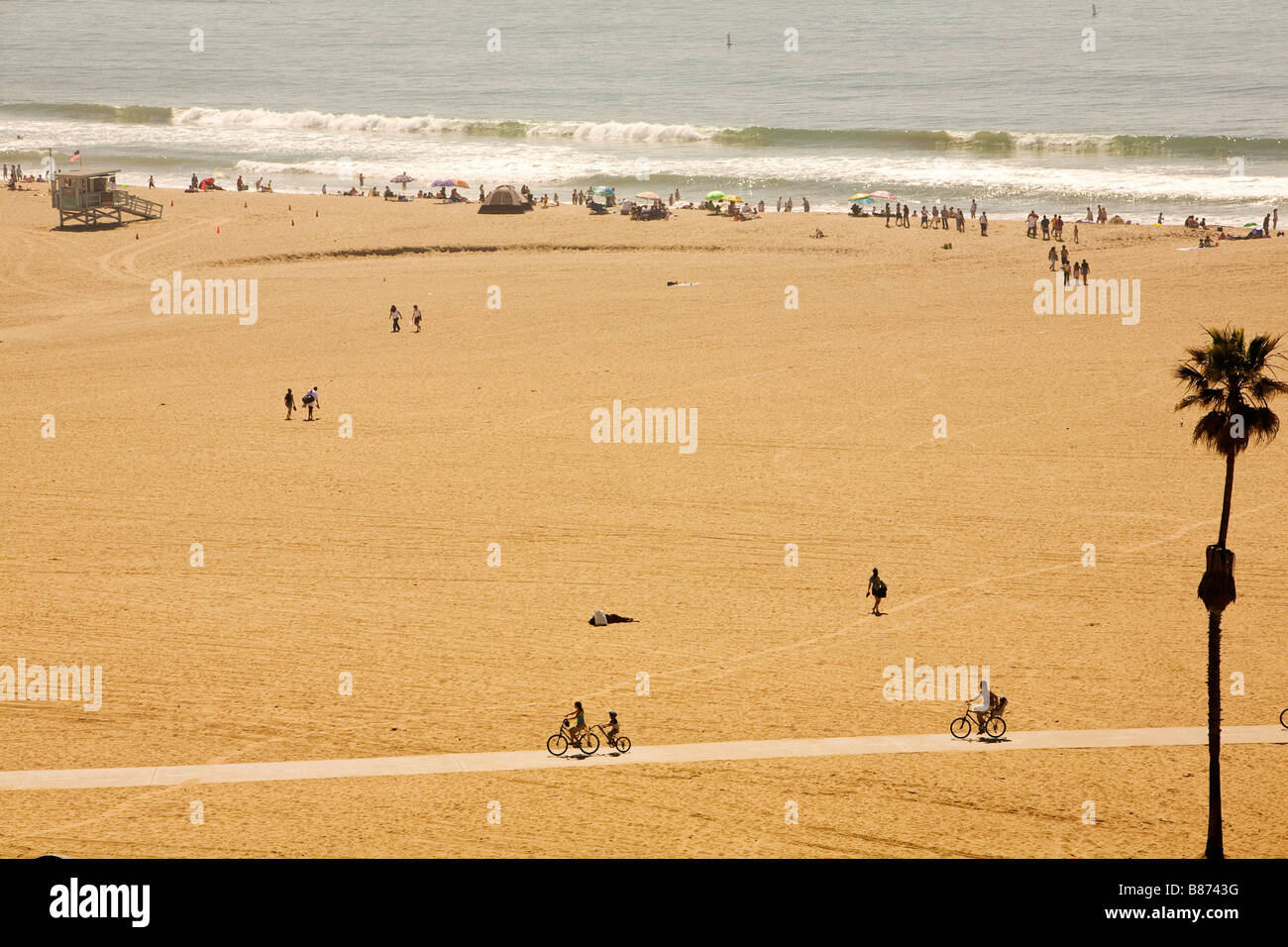 Beach Strand boardwalk in Santa Monica California with bikers and ...