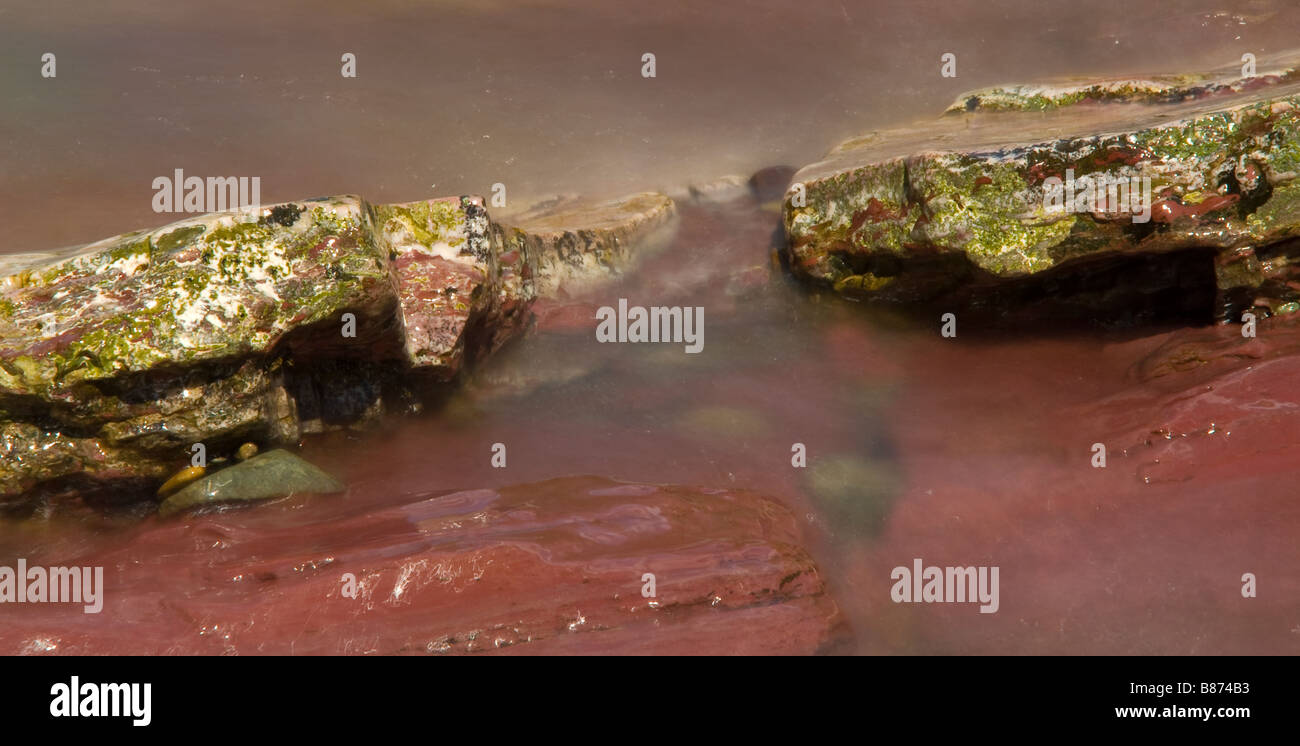 Water flowing smoothly over rocks hi-res stock photography and images ...