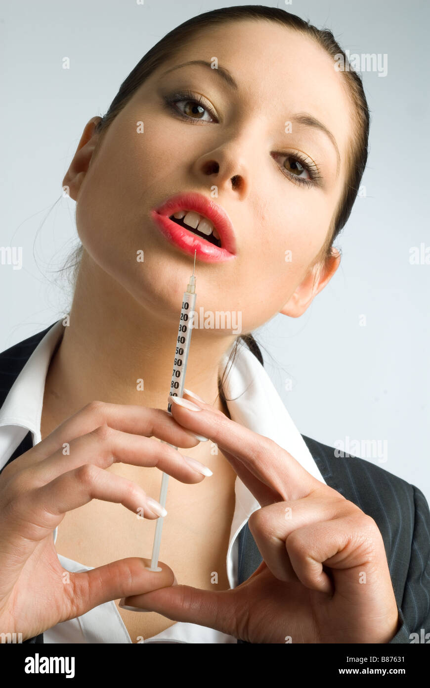 woman with syringe Stock Photo - Alamy