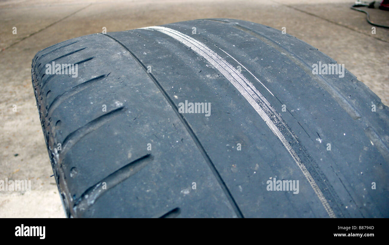 Worn tyres thread bare Stock Photo - Alamy