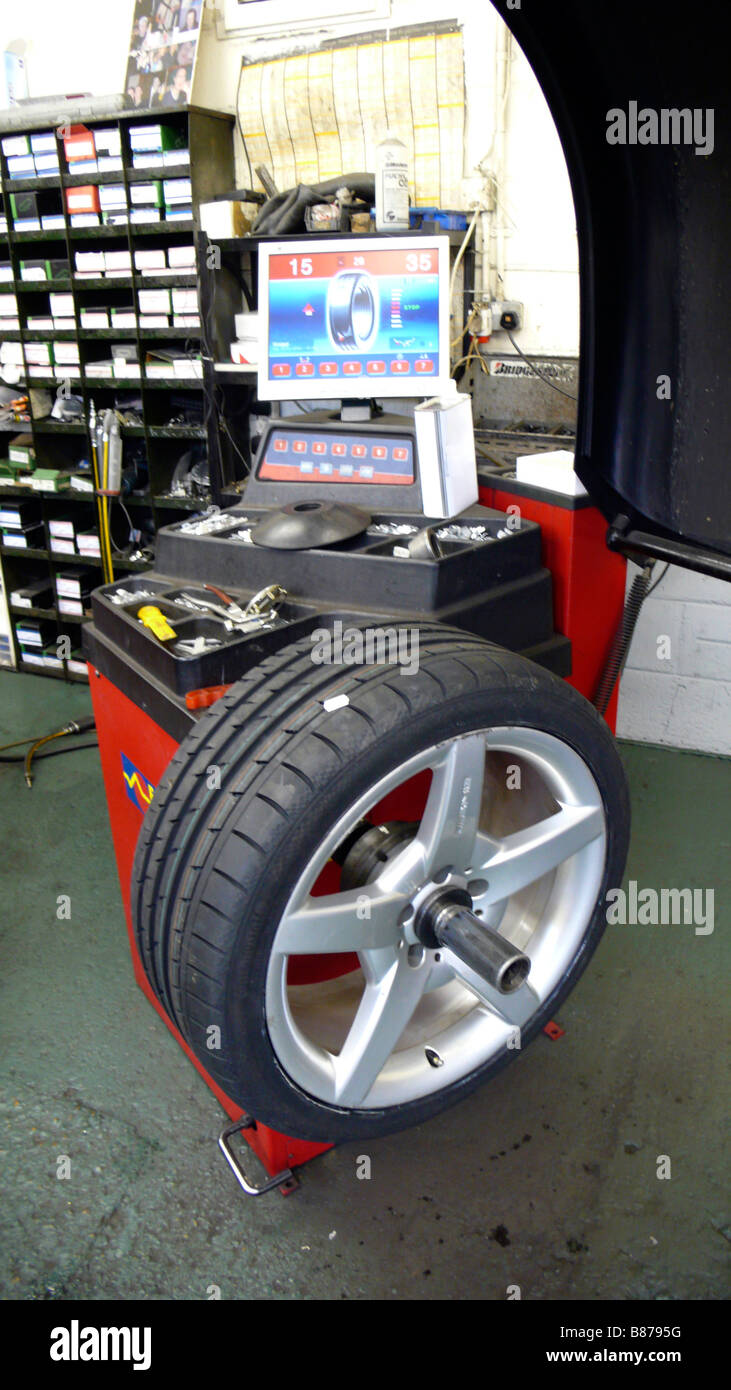Computer wheel balancing machine Stock Photo - Alamy