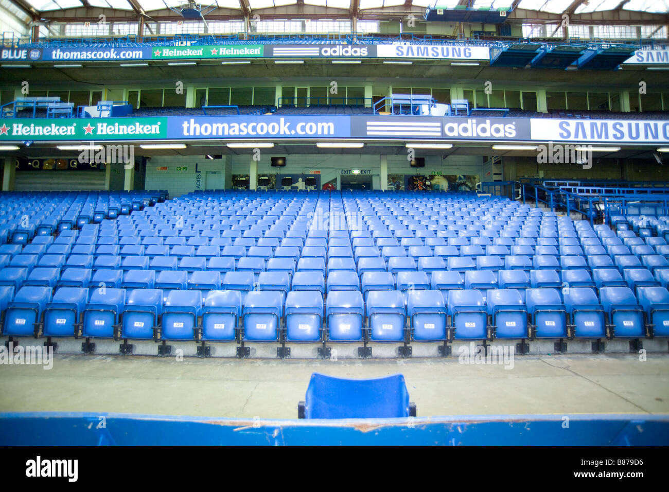 Chelsea football ground seating Stock Photo - Alamy