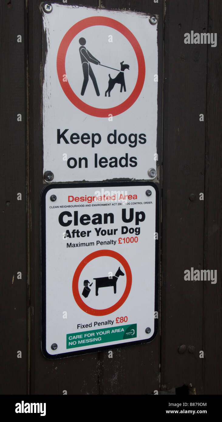 Dog owners signs Keep on Lead Clean Up Stock Photo - Alamy