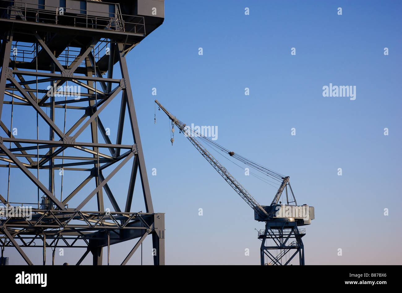 Harbor loading cranes hi-res stock photography and images - Alamy