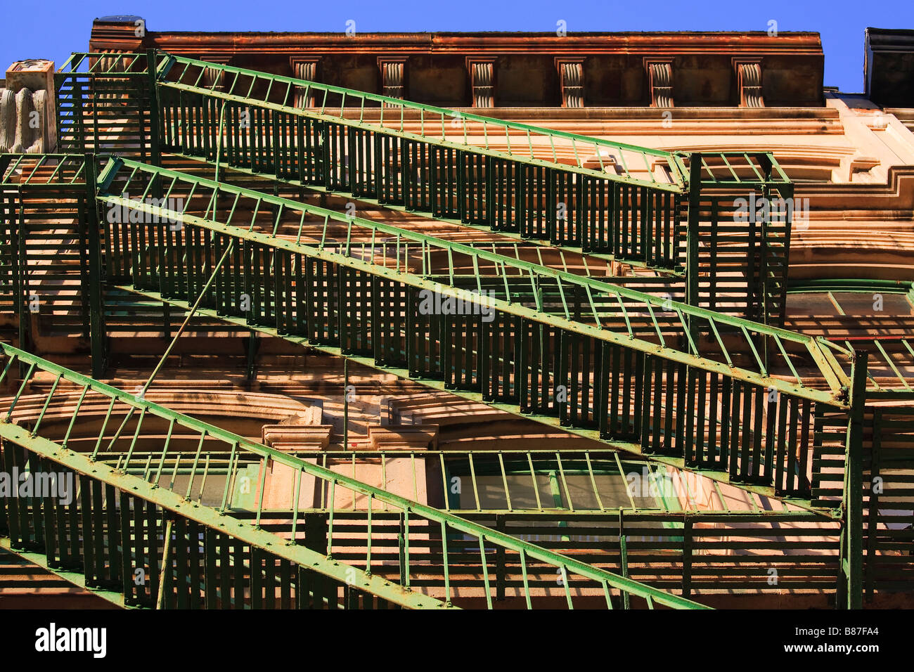 Green metal fire escapes condominium loft building SoHo Manhattan New ...