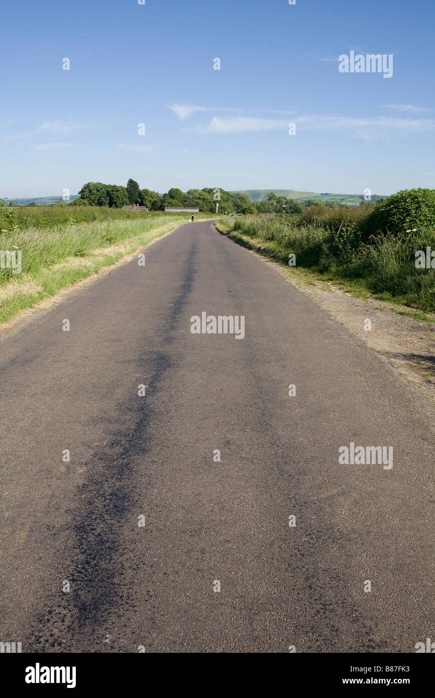The paved road Kings Lane approaching the village of Longcot near ...
