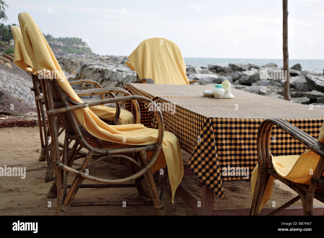 sea view, table and chairs on a beach Stock Photo - Alamy