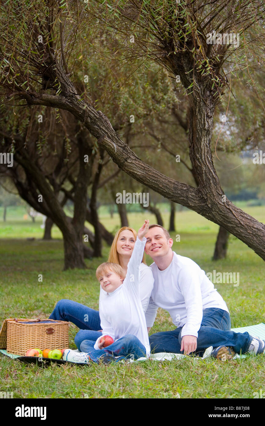 Family going on picnic pointing Stock Photo - Alamy