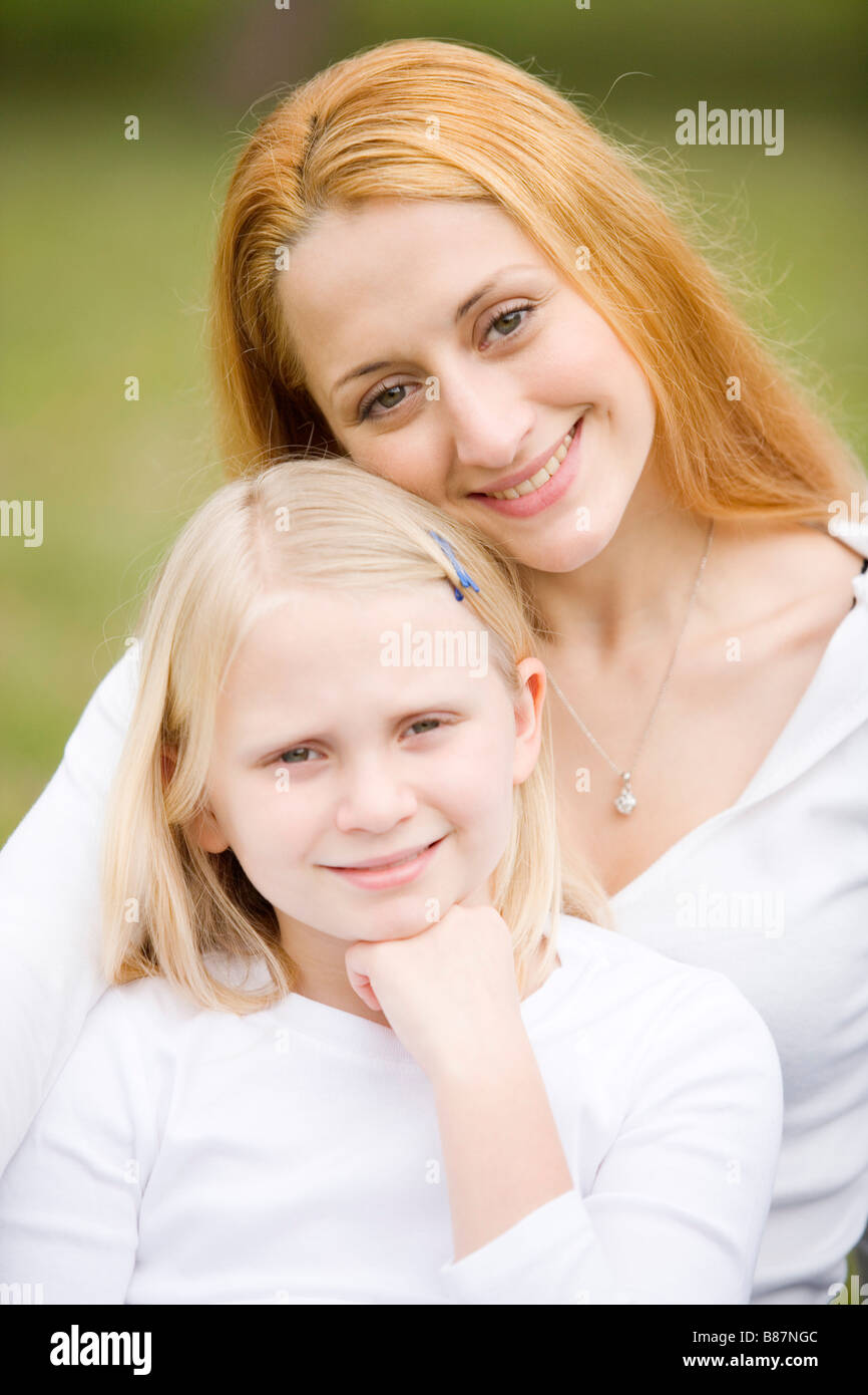 Girl resting chin on her hand Stock Photo - Alamy