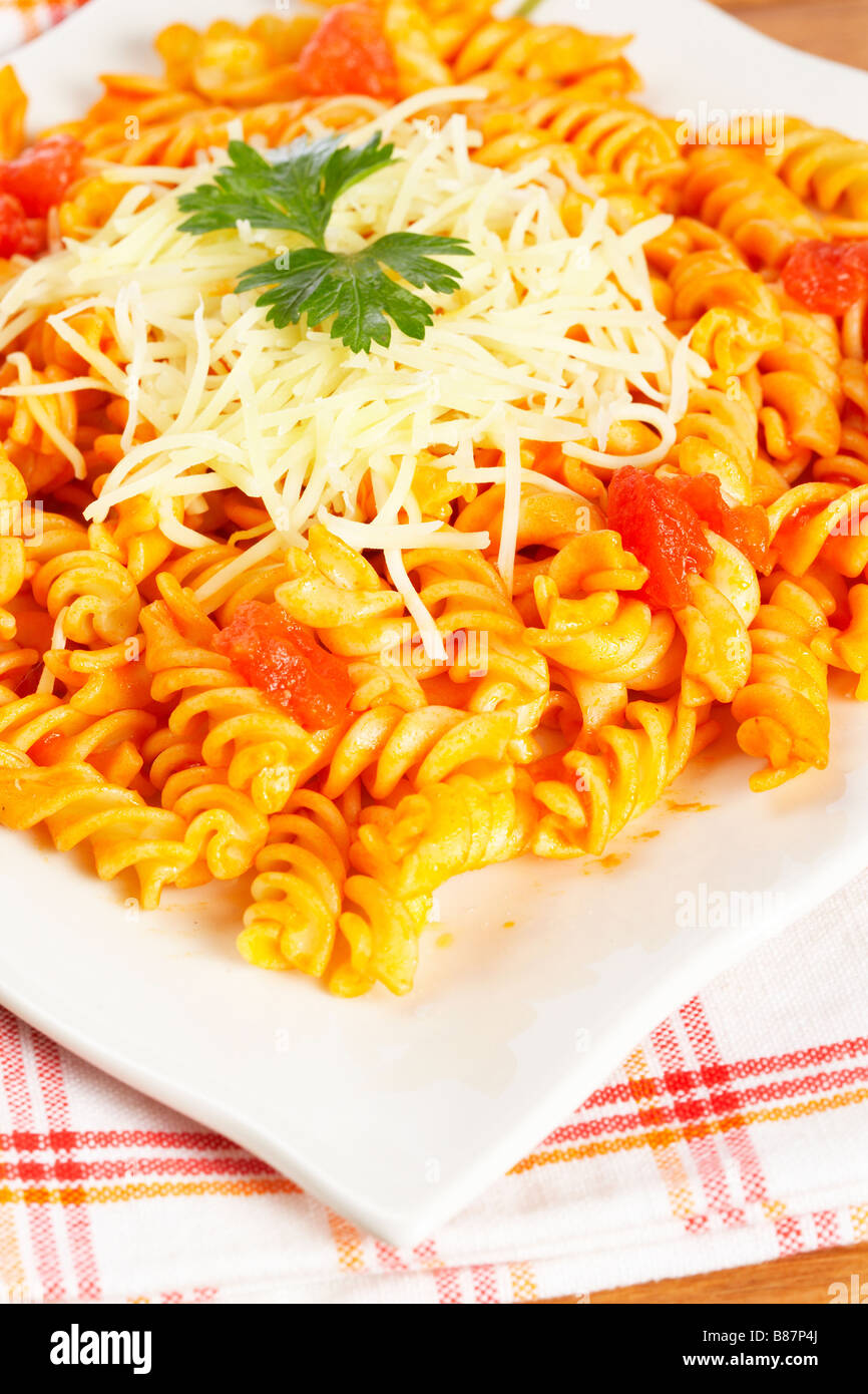 Freshly cooked plate of fusilli pasta with tomato sauce just for eating ...