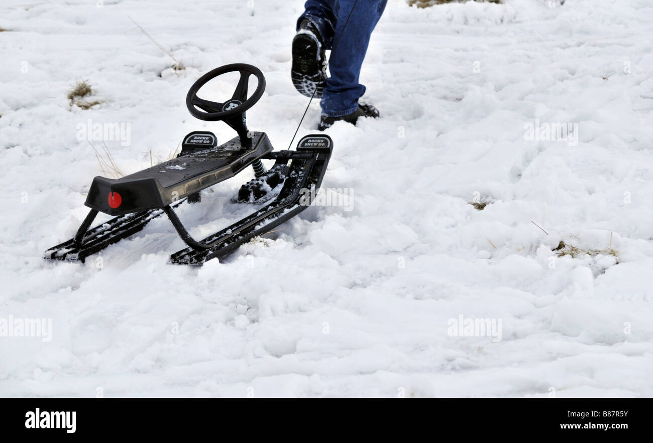 Modern sledge being pulled after heavy snow in Britain Derbyshire ...