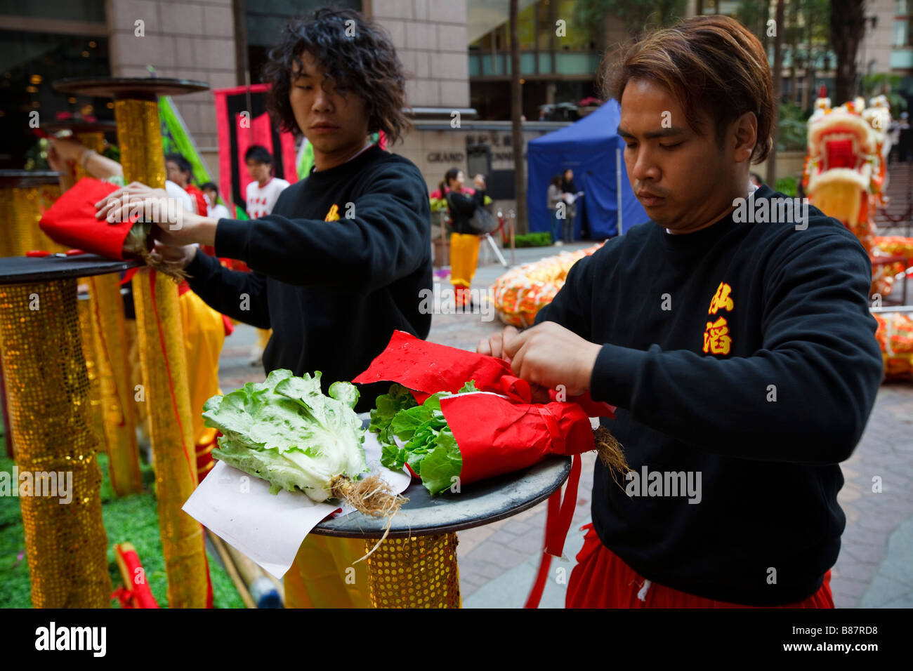 Preparing choi chang for a traditional Chinese Lion Dance to celebrate ...