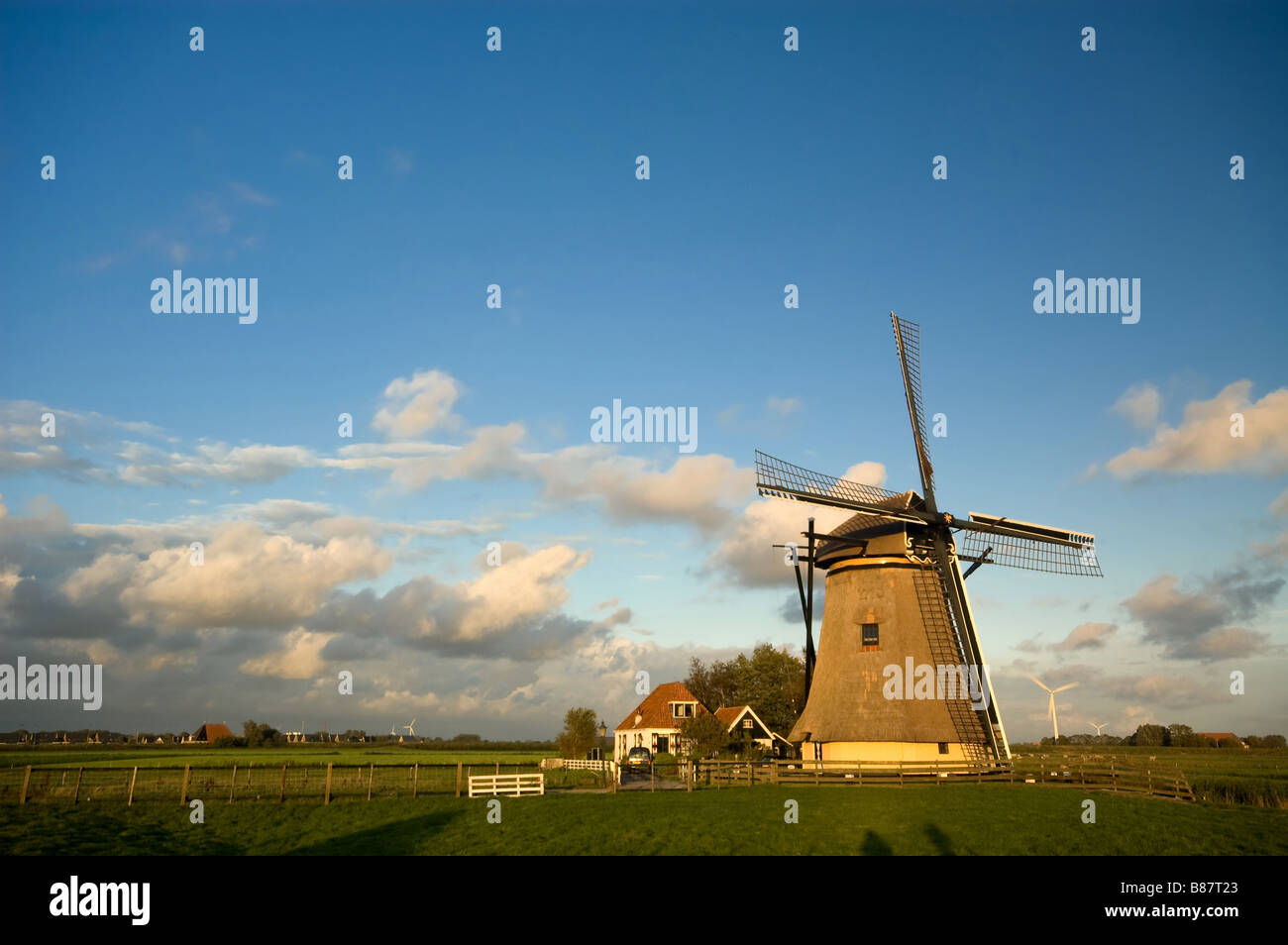 beautiful dutch windmill with blue sky Stock Photo - Alamy