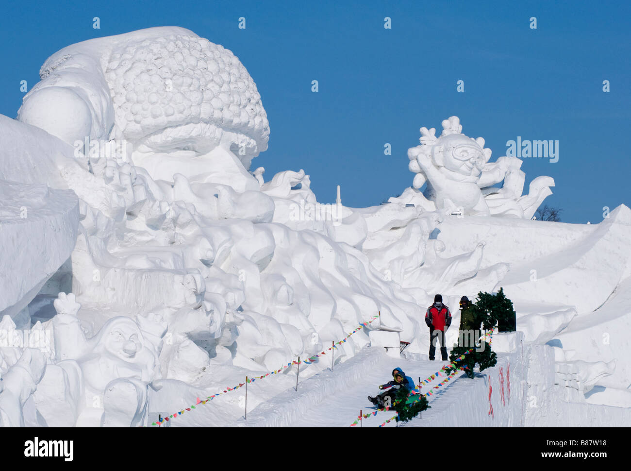 A snow sculpture of Santa Clause at the Snow and Ice Sculpture Festival ...