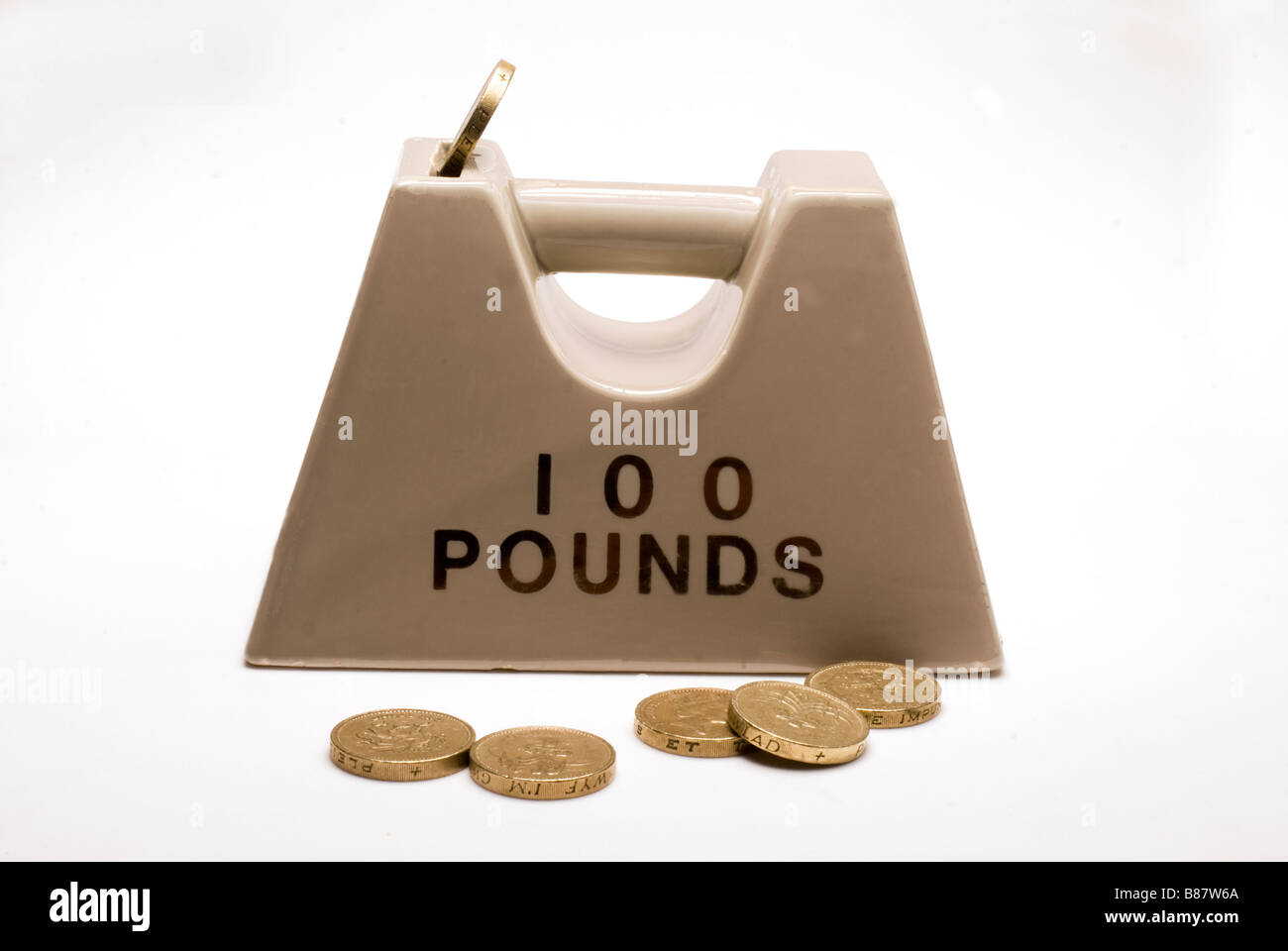 money box and coins Stock Photo - Alamy